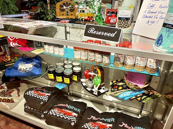 The merch counter—where you can take home a taste of Mac's, minus the dishes and the drive.