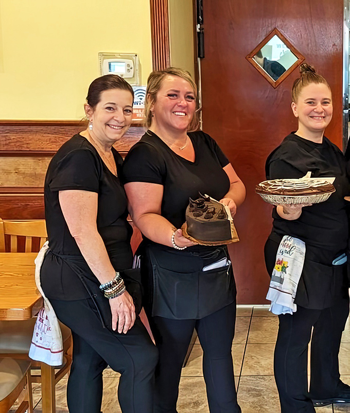 The real magic behind any great diner – a team that treats you like family. These smiles aren't just for the camera; they're the genuine article.