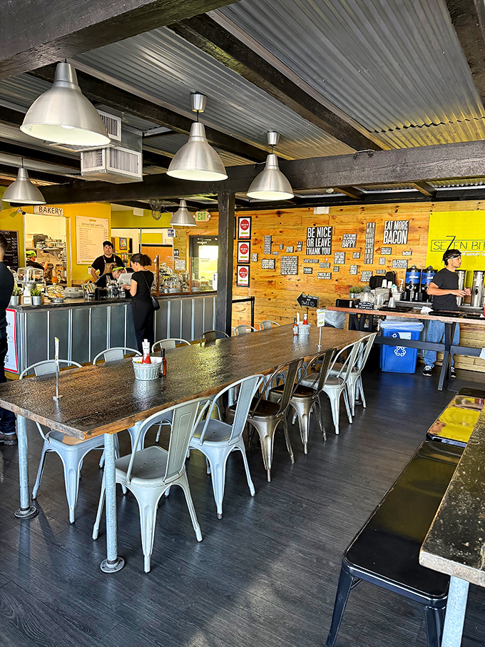 The wizards behind the magic, working their culinary spells in an open kitchen. Those wooden walls display signs that hint at the Se7enBites philosophy.