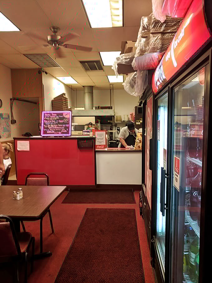 Where the magic happens—a glimpse into the kitchen where dough becomes dreams and sauce becomes salvation.