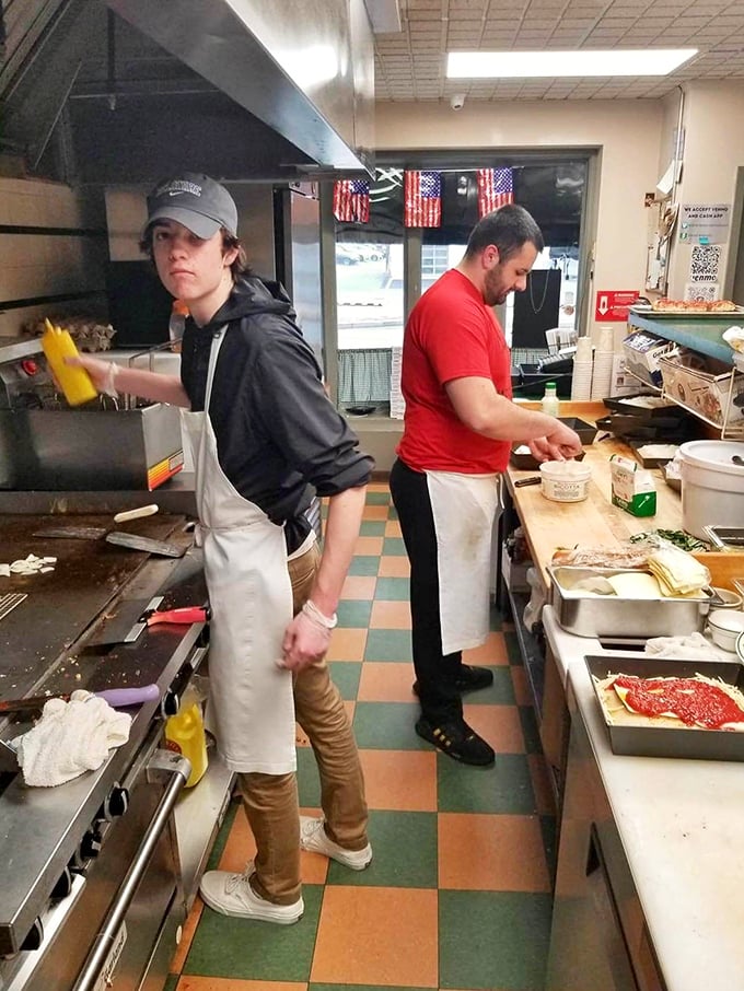 The kitchen dance—where breakfast magic happens without fanfare or Instagram filters. Just skilled hands creating the comfort food we all crave.