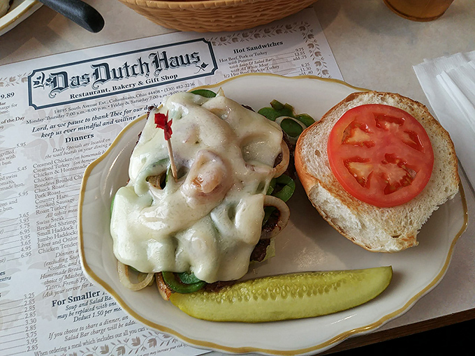 A sandwich that requires both hands and possibly a nap afterward. That melted cheese isn't just a topping—it's a commitment.