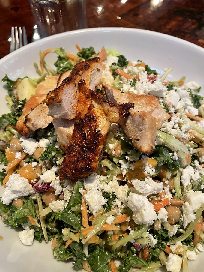 A salad that makes eating greens feel like a reward, not a punishment—topped with perfectly blackened chicken for protein-packed pleasure.