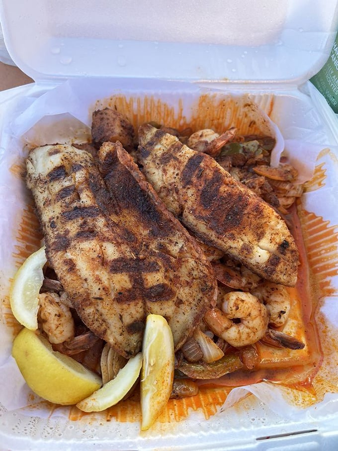 Grilled tilapia and shrimp with lemon—proof that sometimes the simplest preparations yield the most spectacular results.