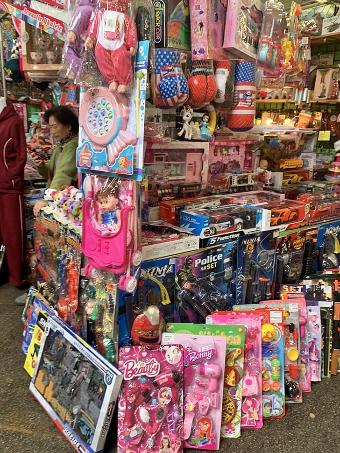 Childhood nostalgia overload! This toy vendor's packed display would make any kid's eyes widen—and parents' wallets nervously retreat into their pockets.