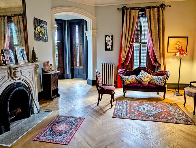 Elegant arches frame this parlor where countless conversations—both earthly and perhaps otherwise—have echoed across the decades.