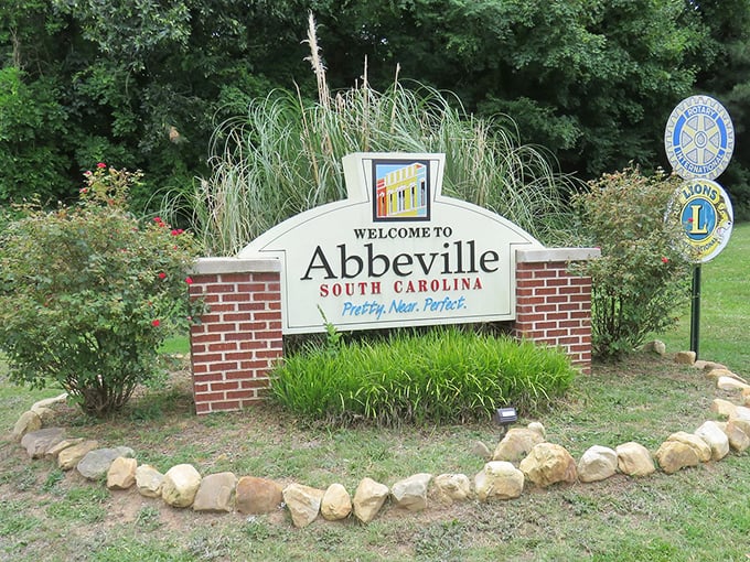 The welcome sign might as well say "Slow down, you're moving too fast" in fancy lettering.