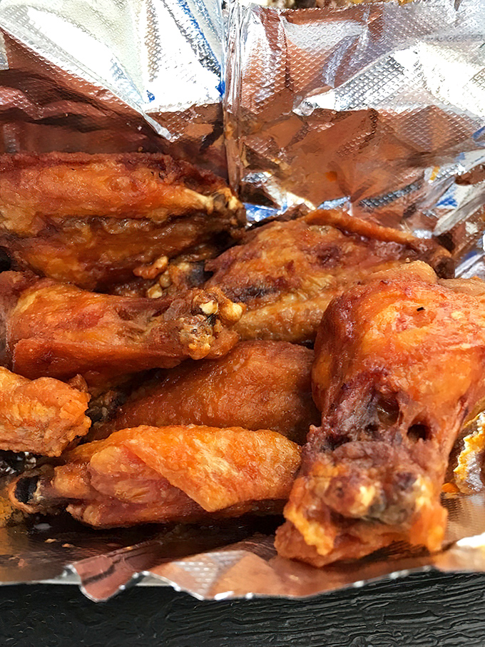 Wings with attitude—crispy, saucy, and unapologetically messy. These aren't first-date food unless you're testing their sense of humor.