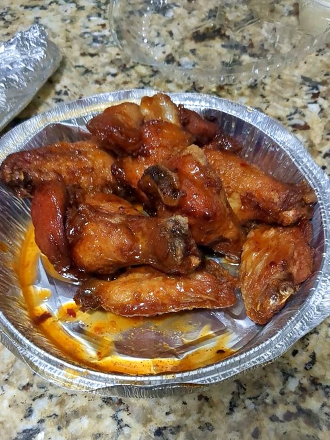 Wings that don't need a sporting event excuse – glazed with sauce that strikes the perfect balance between sweet, tangy and heat.