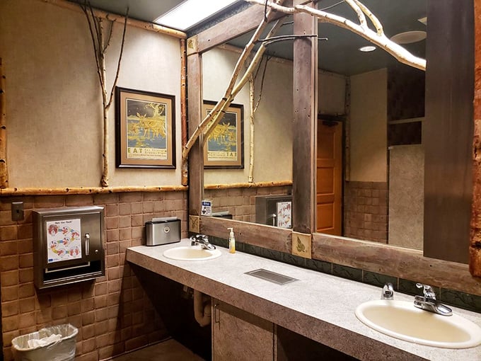 Even the restrooms maintain the wilderness theme—rustic elegance meets practical comfort in every corner of this establishment.