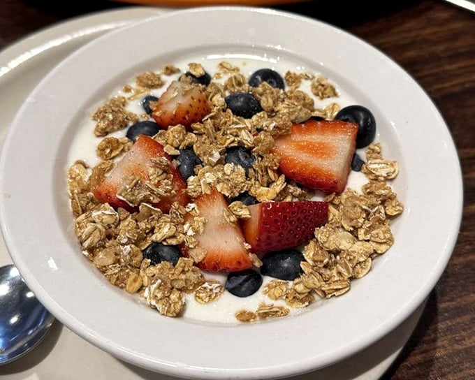 Fresh berries and crunchy granola transform ordinary yogurt into an extraordinary morning starter—healthy enough to justify that second mimosa.