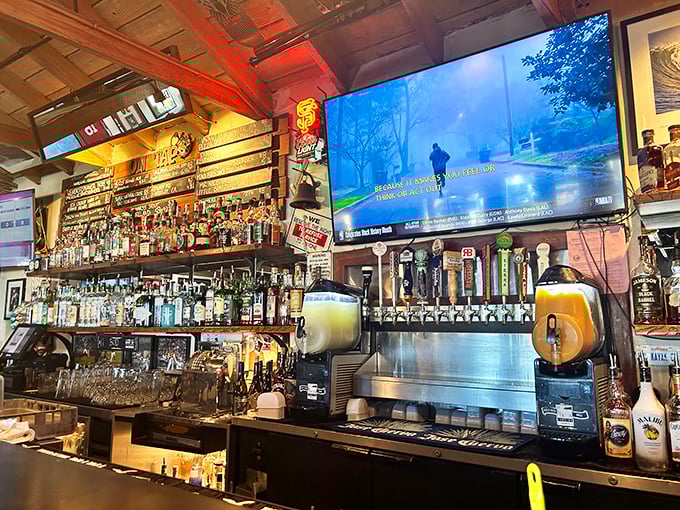 A back bar stocked like a pirate's treasure chest. Whatever your spirit of choice, it's waiting for you here among the weathered wood and warm lighting.