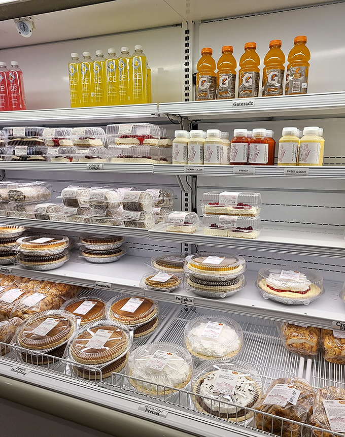 The bakery case: where diet plans go to die happy deaths and "I'll just have one bite" becomes the lie we tell ourselves.