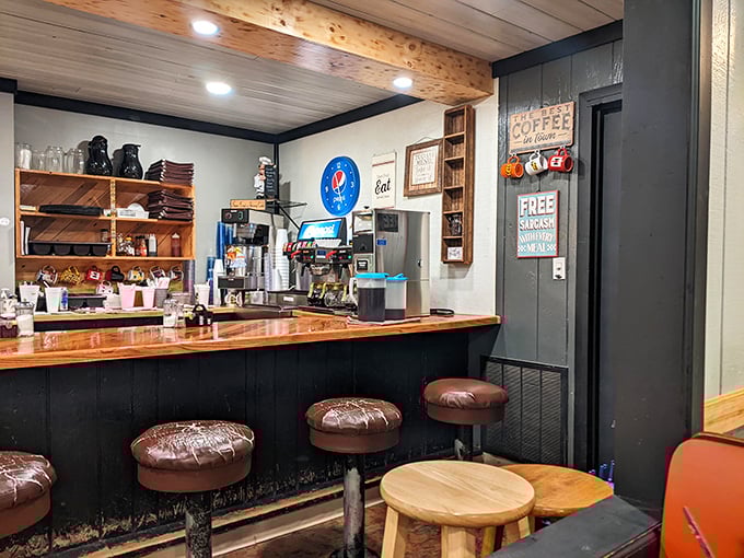 The counter where regulars perch like birds on a wire, watching the coffee-pouring ballet while trading stories about last night's game.