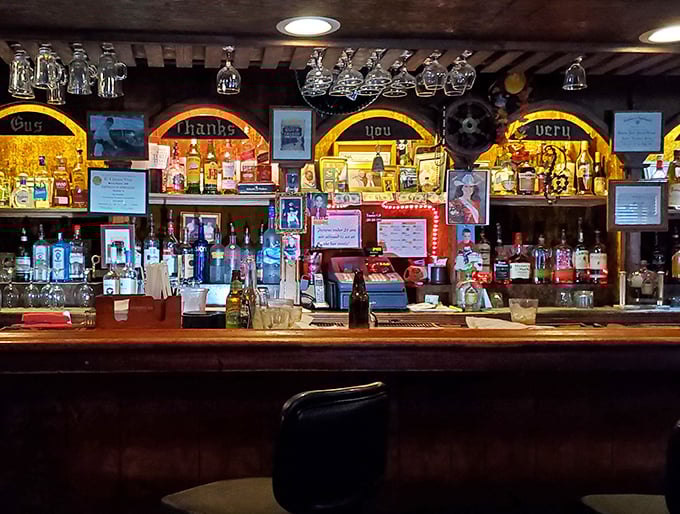 A bar that knows exactly what you need before you even say it. That "Gus thanks you very much" sign speaks volumes about hometown hospitality.
