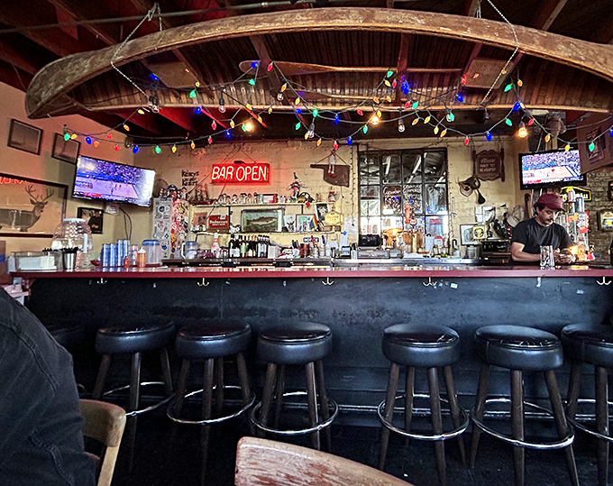 Behind this bar, there are no mixologists crafting twelve-ingredient cocktails – just honest pours and cold beers waiting to meet their chicken soulmates.