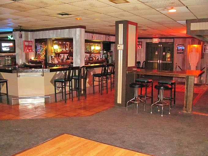 The bar area whispers "stay awhile" with that warm glow – your living room wishes it looked this inviting.