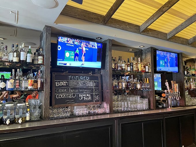 The bar at Bludso's isn't just serving drinks; it's creating liquid counterpoints to all that smoky richness—craft beers and cocktails that cut through the fat.