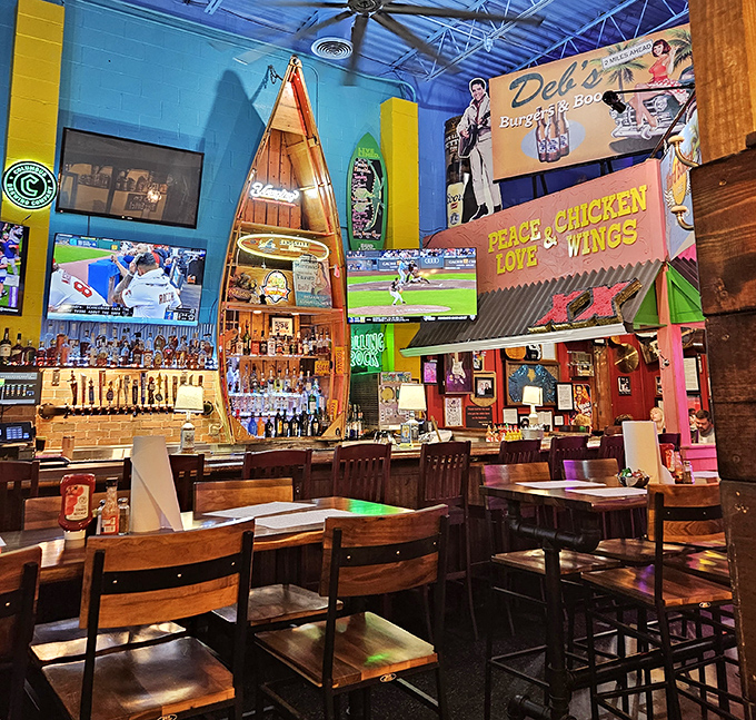 The bar area features an actual boat – because why settle for drinking on land when you can pretend you're at sea?