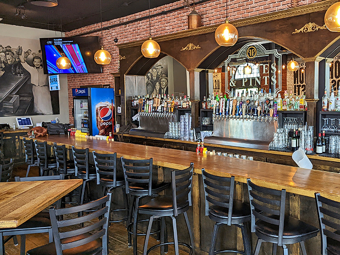The bar's impressive tap lineup stands ready for duty, like a well-trained army prepared to quench the thirst of Portsmouth's discerning beer enthusiasts. 