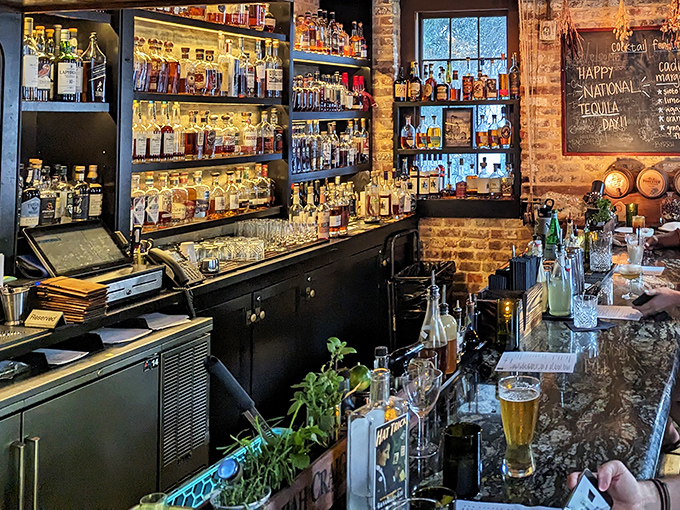 Bourbon heaven! The bar at Husk showcases enough amber spirits to make a Kentucky colonel weep with joy into his mint julep.