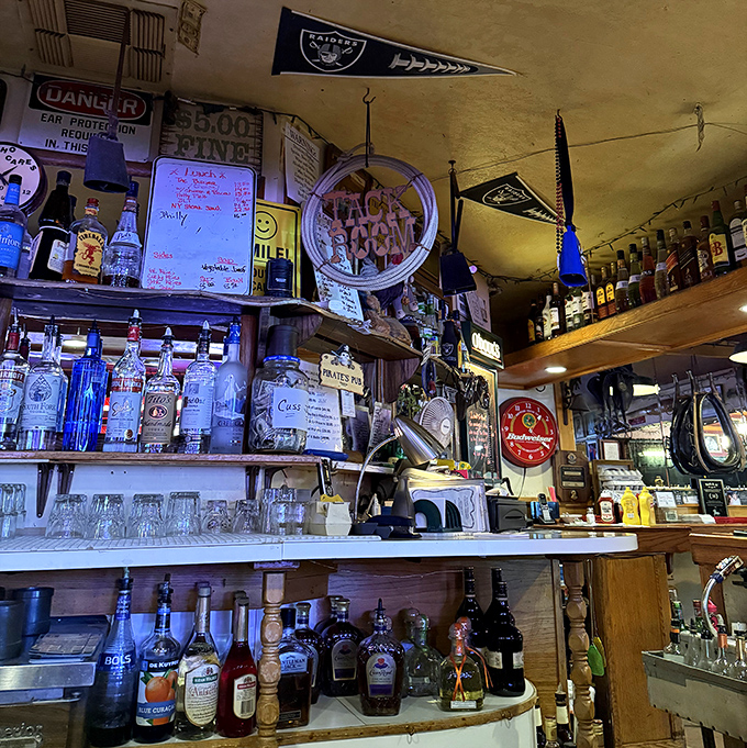 A bar stocked with liquid personality and sports memorabilia—where stories get better with each telling and every pour.