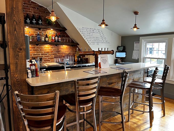 Where coffee magic happens—exposed brick meets reclaimed wood at this bar counter that wouldn't look out of place in Brooklyn but feels perfectly at home in Strasburg.