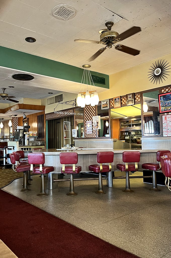 The counter—where solo diners find community, regulars have "their spot," and the staff remembers how you take your coffee before you sit down.
