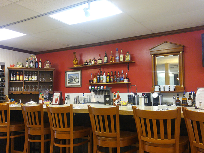 The bar area isn't trying to be trendy—it's aiming for something far more valuable: a place where everybody knows your usual order.