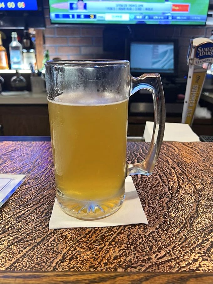 A frosty mug of golden beer—nature's perfect companion to prime rib and the universal signal that good times are officially in progress.