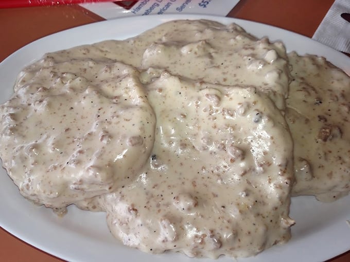 Biscuits and gravy that your Southern grandmother would approve of – a creamy, peppery blanket covering tender islands of dough.
