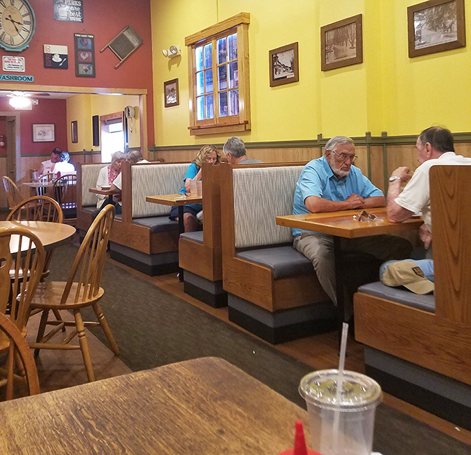 Classic wooden booths where countless conversations, celebrations, and everyday meals have unfolded. These seats have stories to tell.