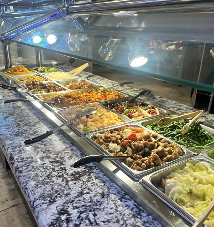 A glimpse of culinary possibilities stretching into the distance. Each metal tray holds a different adventure for your taste buds.