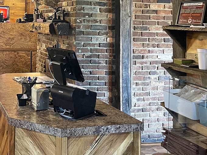 The heart of hospitality—a rustic checkout counter where transactions are seasoned with conversation and maybe a weather report or two.