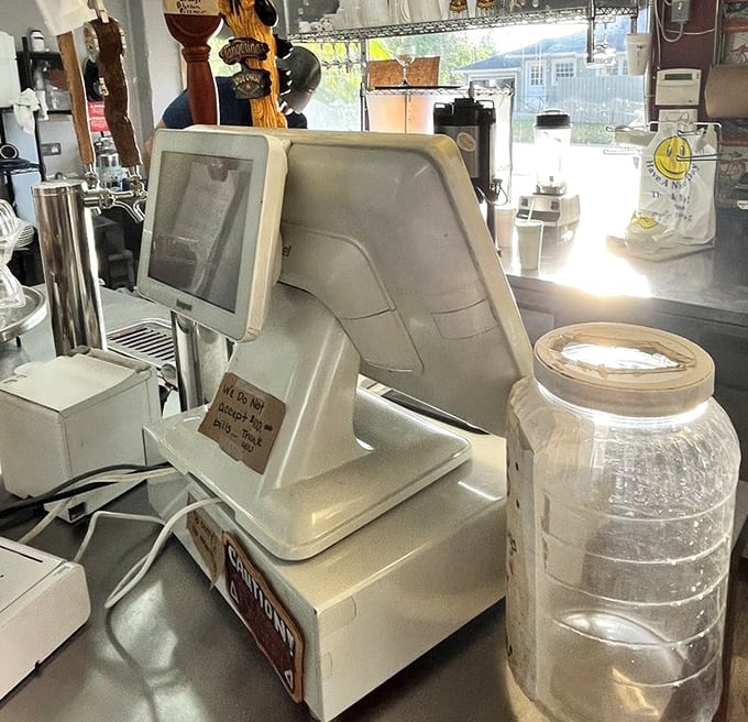 The cashier area – where transactions are merely a formality between you and sandwich bliss. Worth every penny.