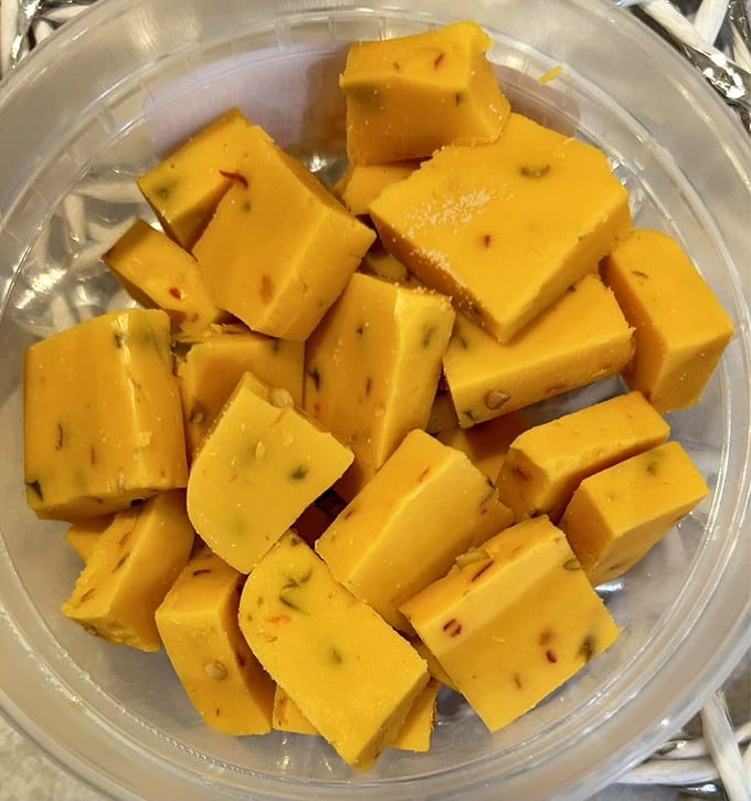 Cheddar snacks lined up like tiny orange soldiers, ready to march into battle against your afternoon hunger pangs.
