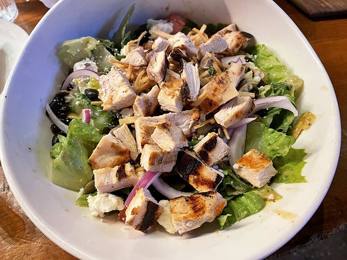 A chicken Caesar salad that actually makes you excited about eating greens—proof that not all heroes wear capes, some wear grilled chicken.