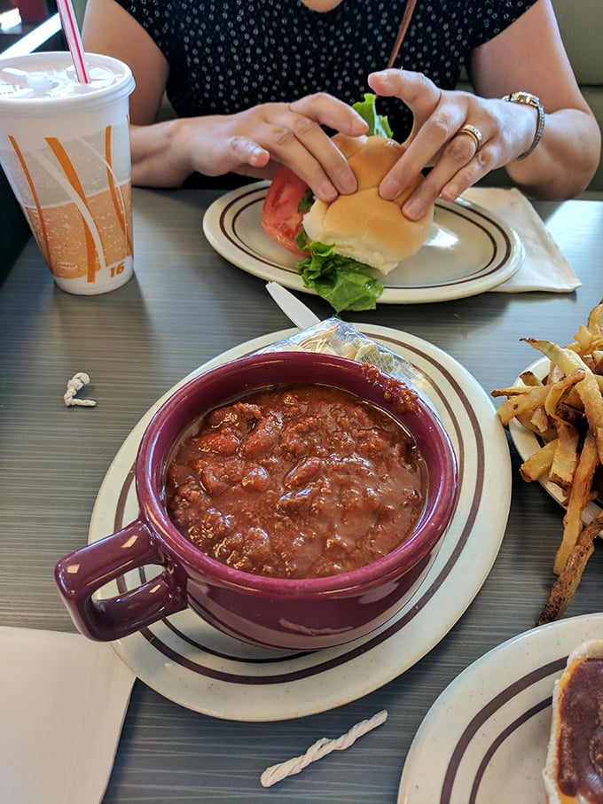 A mug of chili so hearty it could qualify as its own food group. Rich, meaty, and the perfect companion for those crispy hand-cut fries.