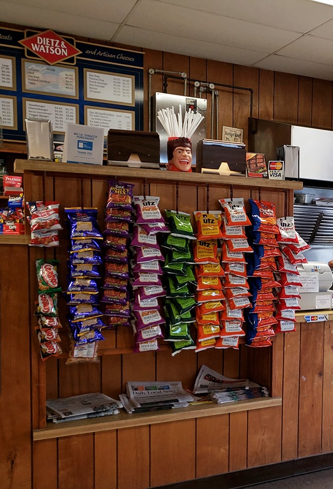 The chip selection at Earl's isn't just a side thought—it's a colorful, crunchy supporting cast for the sandwich stars.