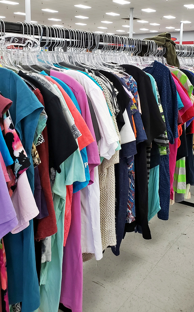 The technicolor dream rack—where yesterday's fashion choices become tomorrow's vintage statement pieces.