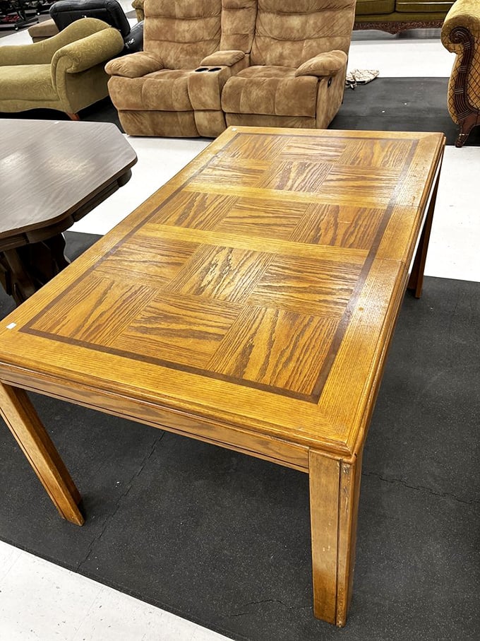 This coffee table's geometric wood pattern tells stories of dinner parties past and future gatherings ahead.