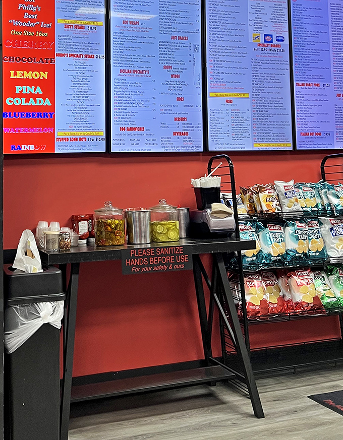 The condiment station—where your sandwich journey gets its final passport stamps. Those pickle chips are calling your name.