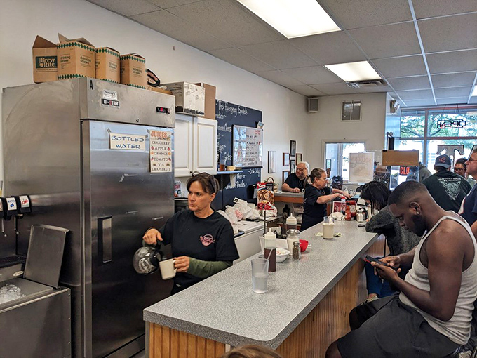 The counter where solo diners become philosophers and coffee transforms into liquid wisdom.