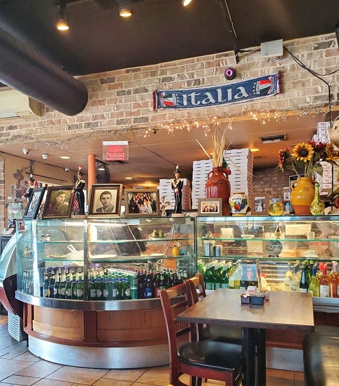 The counter showcases Italian treasures behind glass—colorful gelato and imported delights that transport you straight to a Roman holiday.