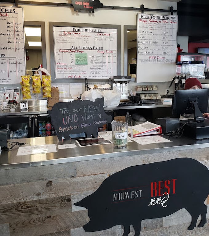 The ordering counter—where dreams are spoken aloud and then materialized as smoke-infused reality. That pig silhouette knows what's up.