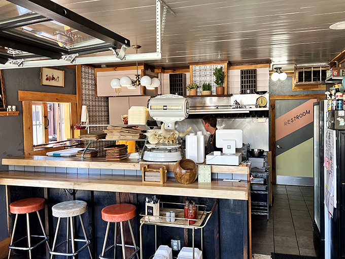 Behind this counter, burger magic happens. The open kitchen design isn't just trendy—it's theater where every sizzle and flip builds anticipation for the main event.