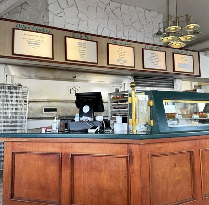 The pie menu board reads like poetry to dessert lovers. Each category promises a different path to bliss, with no wrong choices.