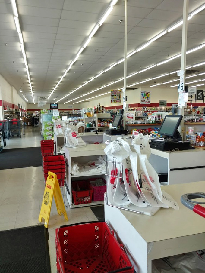 The final frontier: checkout counters where treasures become possessions. The red baskets await their next thrifting adventure.