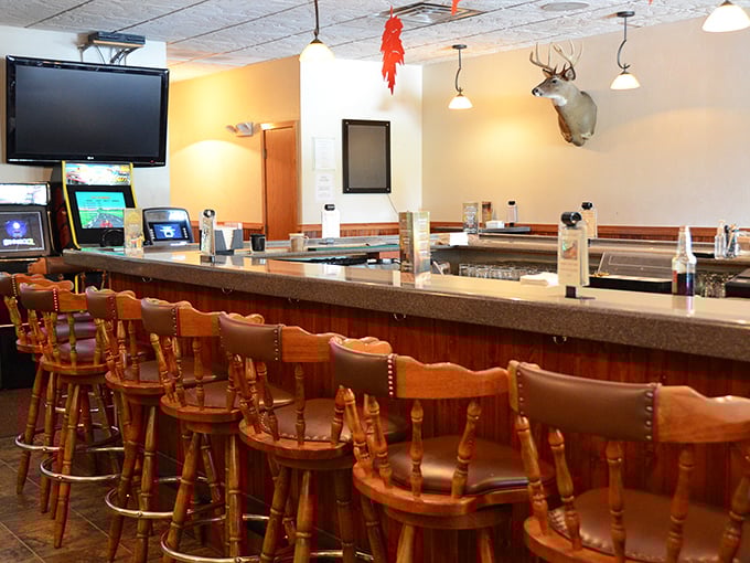 The bar area – where strangers become friends and "just one drink" becomes "we should probably order dinner."