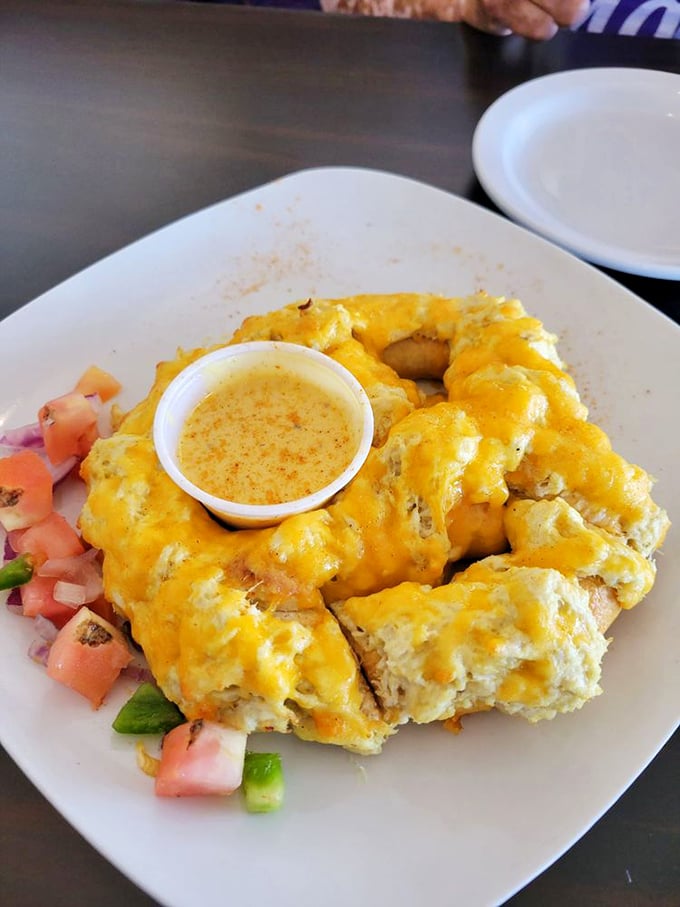 Behold the crab pretzel—where Maryland tradition meets comfort food innovation. That melted cheese blanket is tucking in some serious crab meat. 